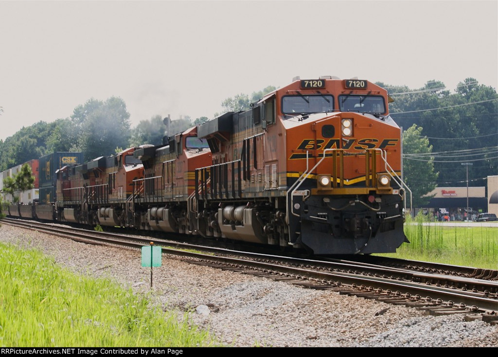 BNSF 7120, 5237, 8104, and 4590 get the green, generate some smoke, and roll out